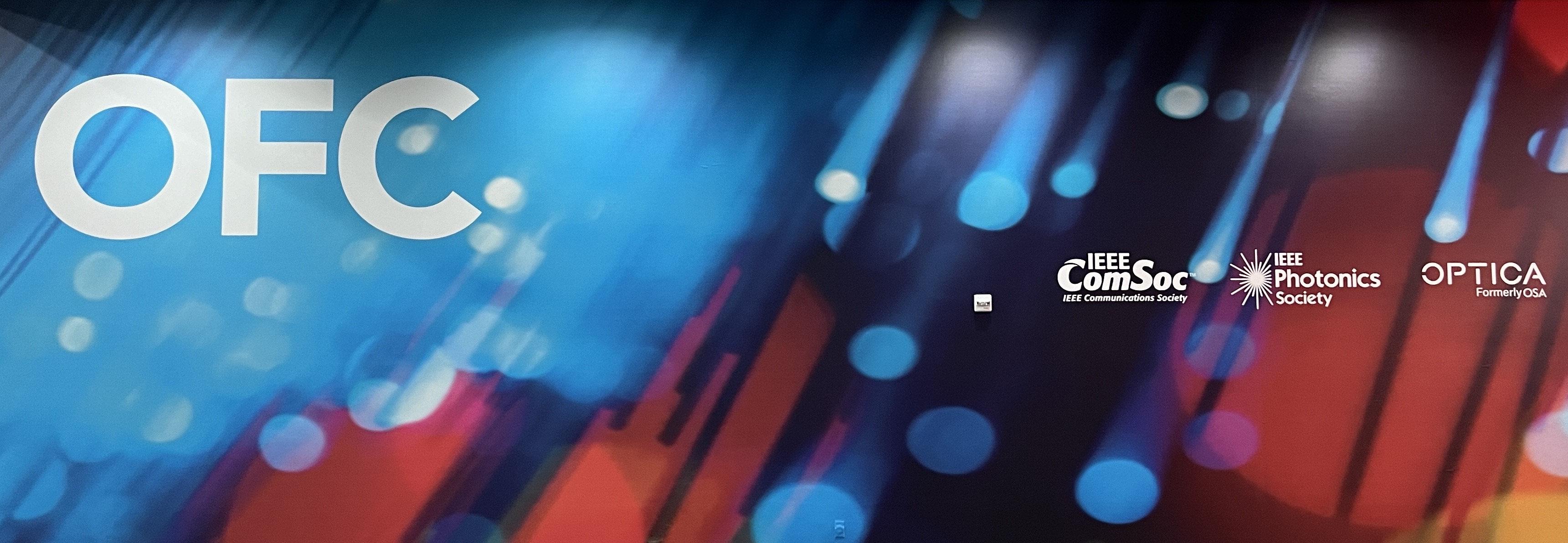 AI驱动光通信网络技术发展, 阿里云在OFC2024发表多个创新成果和报告-阿里云开发者社区